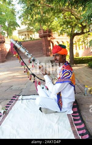 Indian rajasthani folk musician playing wind musical instrument shehnai ...