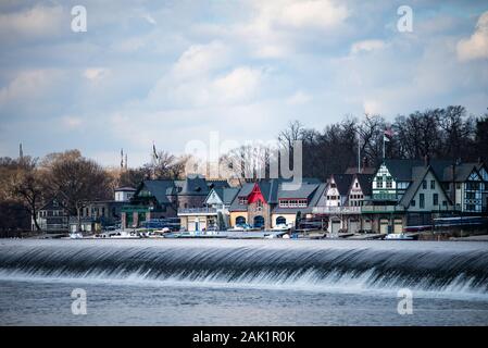A view of Philadelphia's famous Boathouse Row visible behind the weir ...