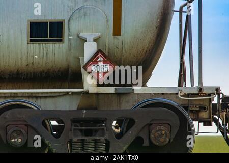 Close up of a flammable liquid sign on the back of a tanker carrying ...