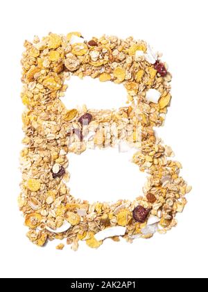 Letter I of the English alphabet muesli with coconut, berries, raisins ...