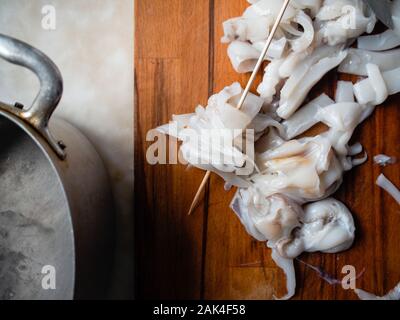 preparing a mediterranean cuttlefish Stock Photo - Alamy