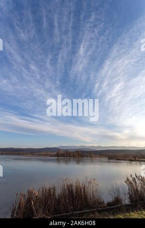 Reservoir lake of Maconka near Batonyterenye in Hungary on a winter day ...