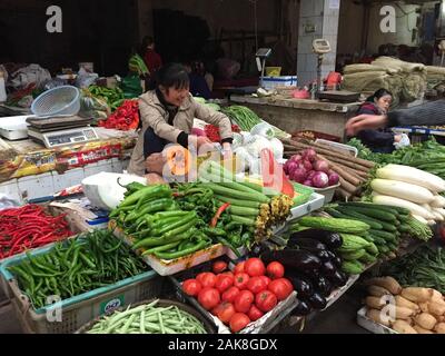 Chengdu, China - Nov 2, 2015. Fresh vegetables and fruits at local ...