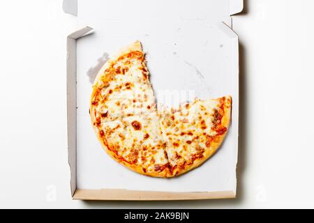 Tuna pizza in a cardboard box Stock Photo - Alamy