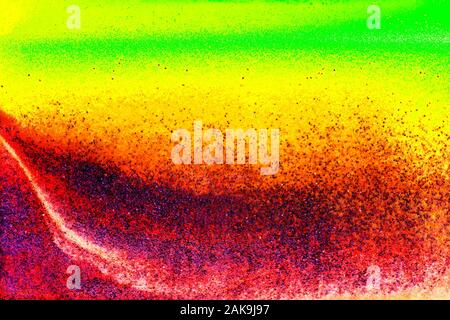 Colorful sand pigments falling down in water. Abstract landscape ...