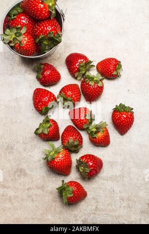 Delicious strawberries in a galvanized bucket on a marble table Stock ...