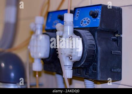 plastic laboratory dispenser with chemical liquid Stock Photo - Alamy