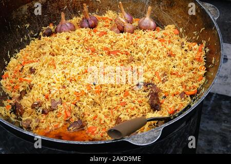 Asian traditional pilaf with beef and carrot Stock Photo - Alamy