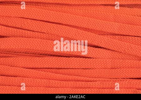 Orange and yellow shoelaces texture close-up Stock Photo - Alamy