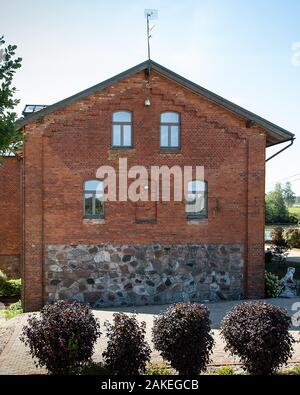Red brick manor house after restoration Stock Photo - Alamy