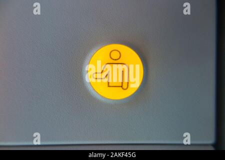 Button to call the flight attendants above passenger / passengers seat ...