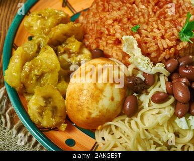 Waakye, Ghanaian cuisine, cooked rice and beans, mixed with boiled eggs ...