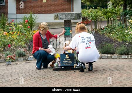 People remember Baby P on the anniversary of his death at the Cemetery ...