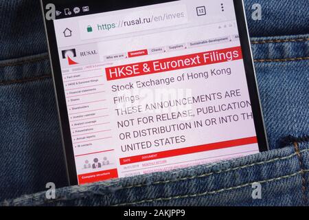 UC Rusal logo displayed on smartphone hidden in jeans pocket Stock ...