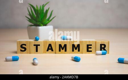 Stammer word made with building blocks. medical concept Stock Photo - Alamy