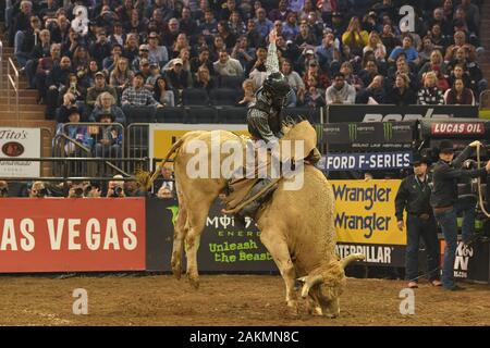 Professional bull rider Brady Fielder rides ”Chuck & Larry” during ...