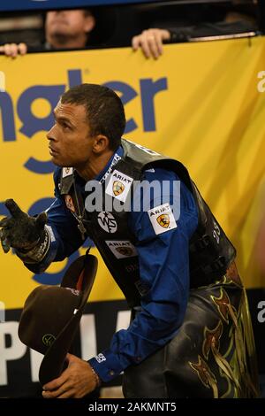 Professional Bull Rider Eduardo Aparecido rides bull Tulsa Time during ...