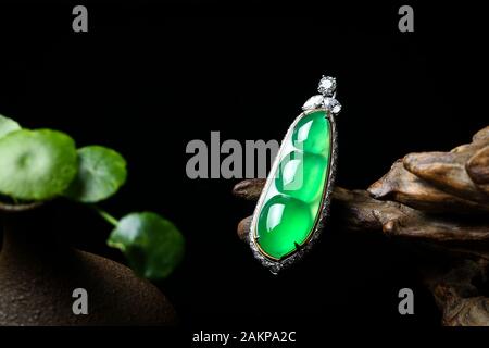 Imperial green jadeite jade pendant Stock Photo - Alamy