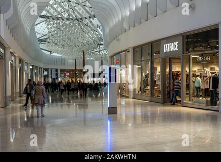 Greenwich, UK - 5 October 2019: Shoppers inside the mall area of the O2 ...