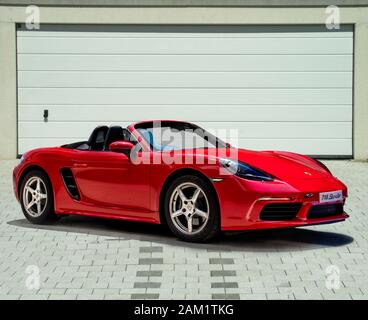 Porsche 718 Boxter sport car, side view isolated on white background ...