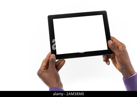 View from behind of an African man holding a tablet computer in his ...