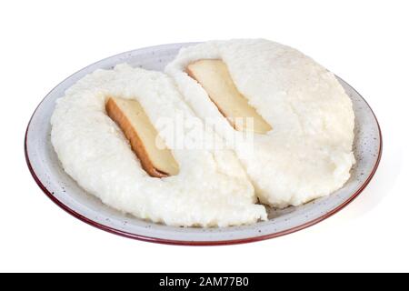 Mengrelian corn mamalica (ghomi) with cheese and various herb on wooden ...