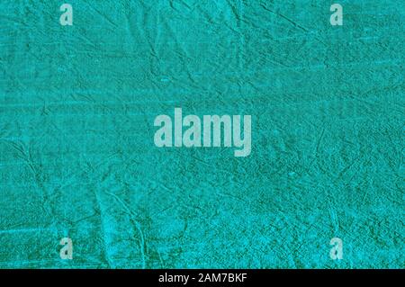 Texture of turquoise shantung silk fabric closeup as textile background ...