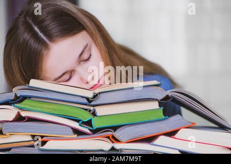 teenage girl is overwhelmed by her homework Stock Photo - Alamy
