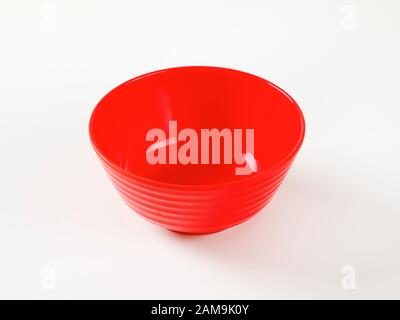 Empty deep red plastic bowl Stock Photo - Alamy