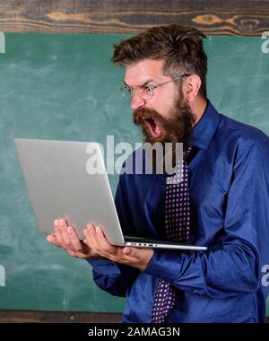 Annoyed by slow internet. Slowly internet annoying him. Hipster teacher ...