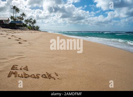 Eid al Fitr greeting written with colorful chalk Stock Photo - Alamy