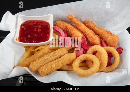 Snack platter - French fries, spring rolls, fried sausage, chicken ...