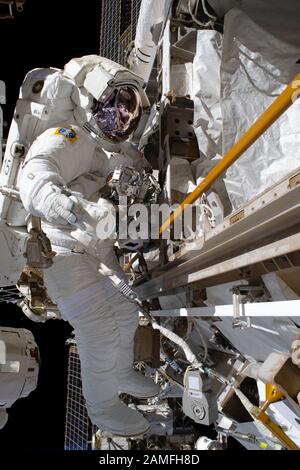 ISS - 22, 2019) --- Astronaut Andrew Morgan of NASA is tethered to the ...