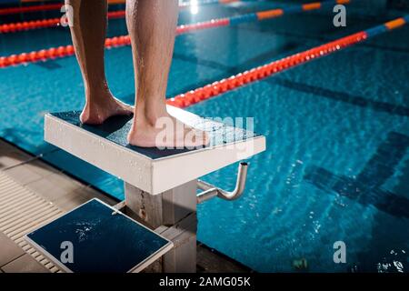 diving block near swimming pool with blue water Stock Photo - Alamy