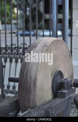 Old sharpening stone wheel Stock Photo - Alamy