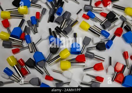 Multicolored metal-plastic tips for crimping stranded electrical wires ...
