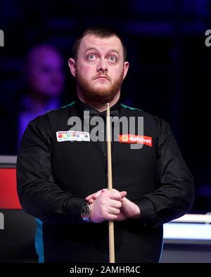 Mark Allen during his match against Judd Trump on day five of the 2026 ...