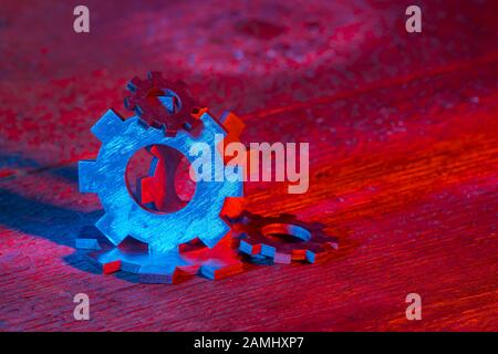 Gears. Machine part. Neon color Stock Photo - Alamy