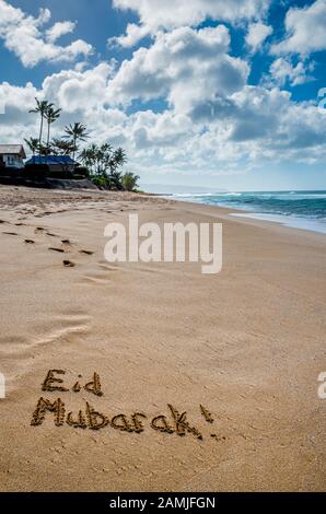 Eid al Fitr greeting written with colorful chalk Stock Photo - Alamy