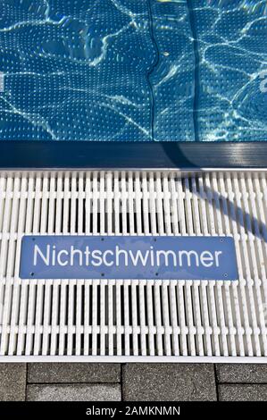 Swimmer in the outdoor pool at the Michaelibad in the district of ...