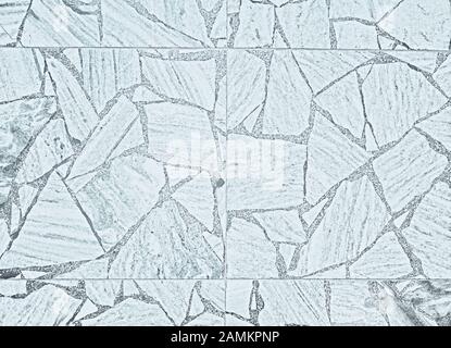 Decorative slate stone paving of path RHS Gardens Royal Horticultural Society garden Rosemoor ...