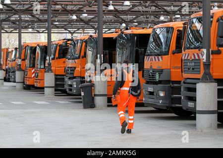 Refuse collection vehicles in the carport of the headquarters of the ...