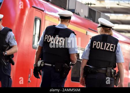 German Federal Police Policeman in blue uniform carrying a Heckler ...