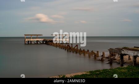 Dilapidated old fishing dock collapsing into the sea in Pak Nam Pran on ...