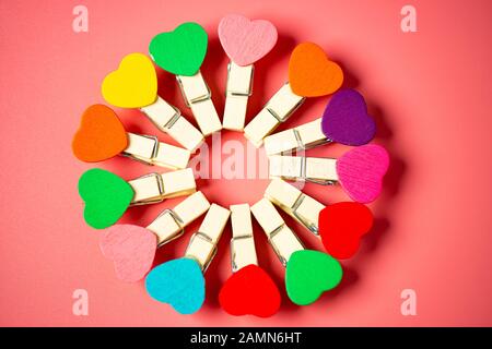 Beauty Colorful mini hearts with other color blur pink background and ...