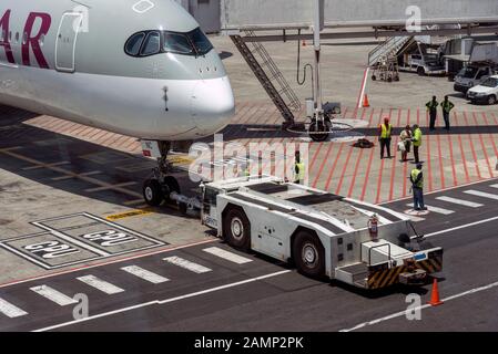 Aerodrome tow tractor for push back plane isolated Stock Photo - Alamy