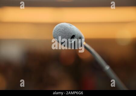 Close-up shot of a microphone with defocused background Stock Photo - Alamy