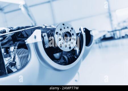 Detail of a small sports aircraft engine shaft. Ultralight aircraft in ...
