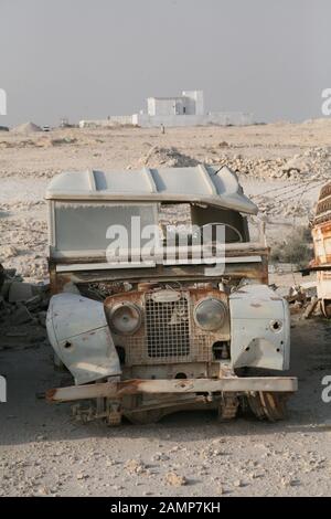 Land rovers on a scrap yard in the middle east Stock Photo - Alamy
