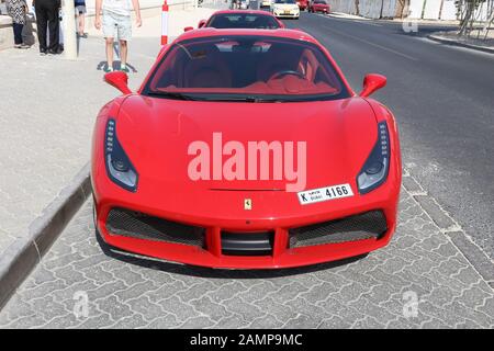 A Ferrari 488 GTB Front view with headlights on and turned wheel Stock ...